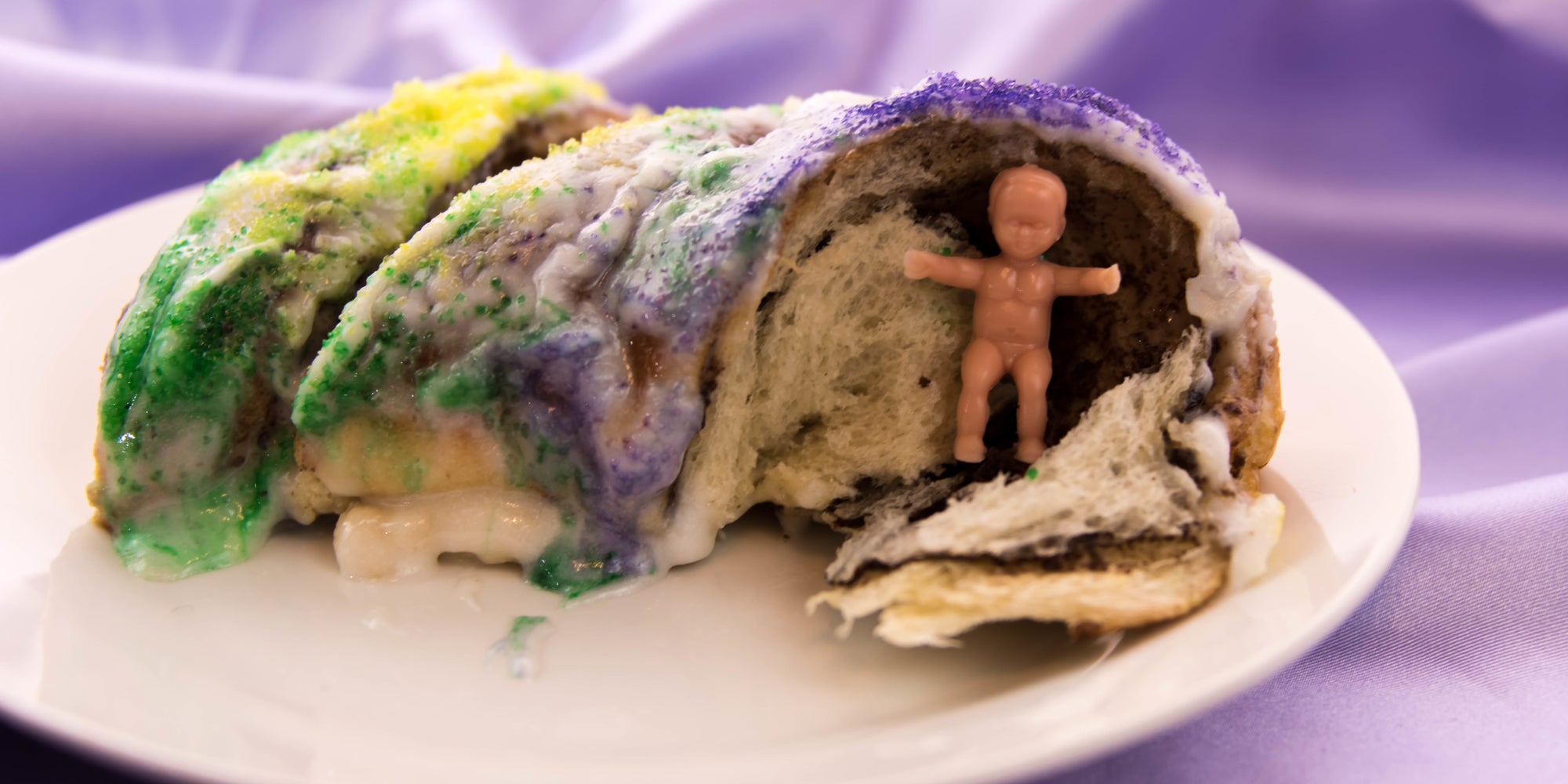 Here's Why There's A Plastic Baby Jesus Hiding Inside Your King Cake ...