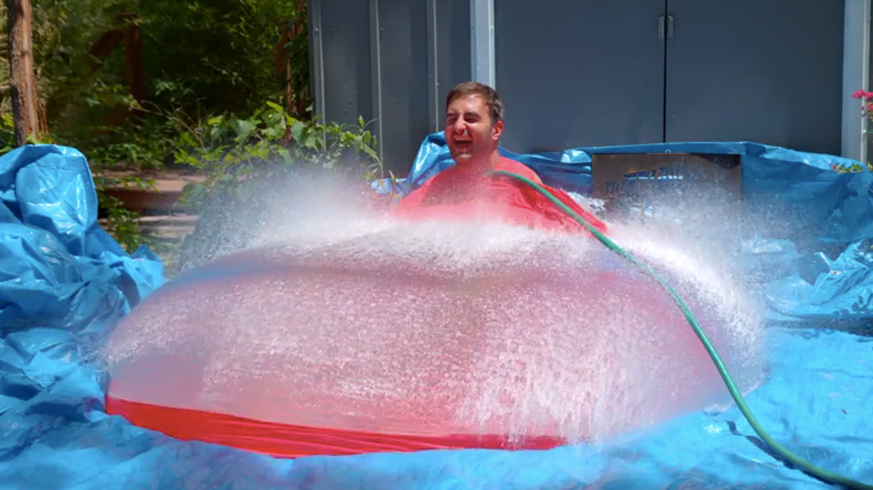 Watch A 6-Foot Water Balloon Pop In Slow Motion -- With A 6-Foot Man ...