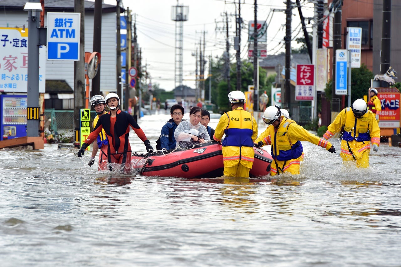 Authorities Evacuate 100,000 After Raging Floodwaters Swamp Japan ...