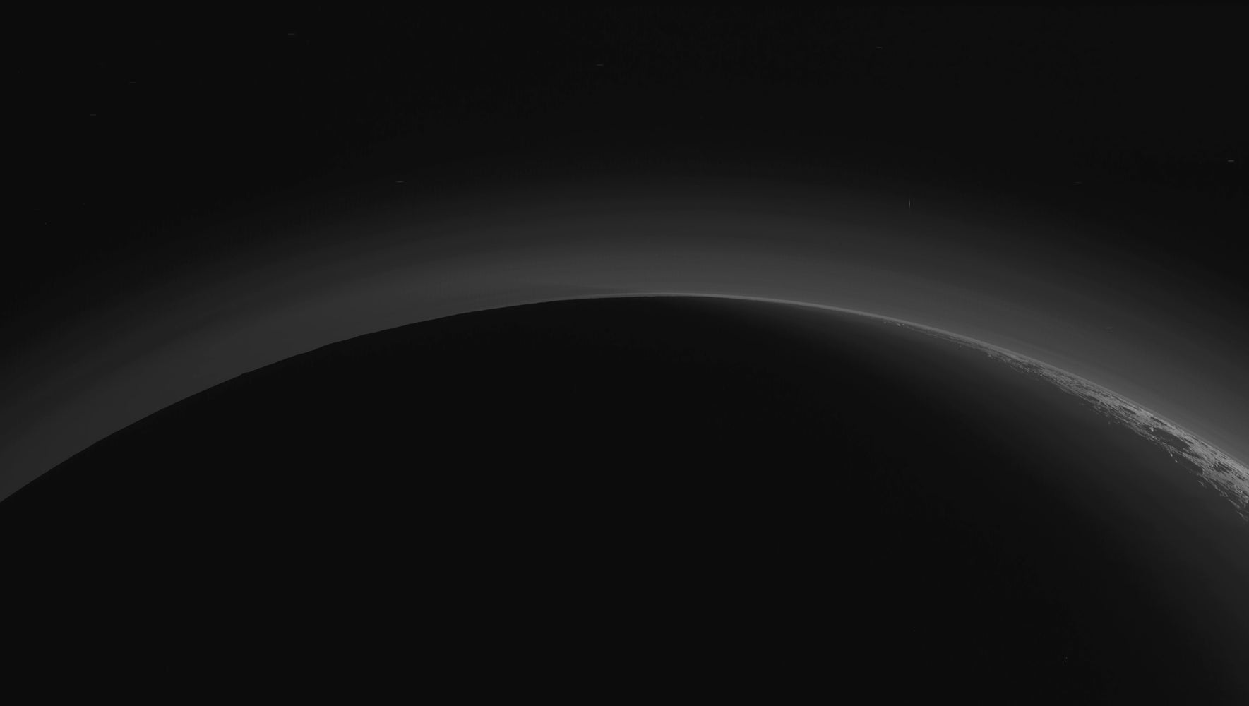 New NASA Photo Shows A Crescent Pluto In All Its Glory | HuffPost