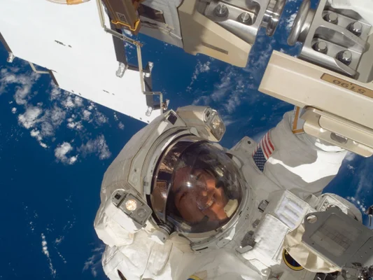 Astronauts Floating In Space Station