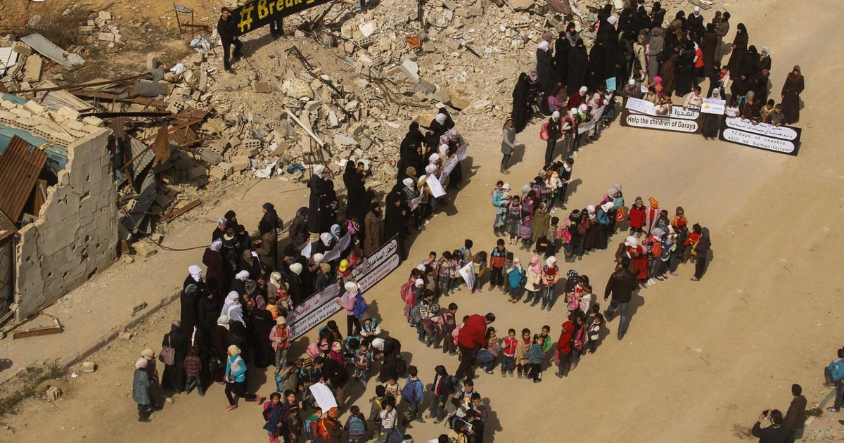 Civilians Trapped In Syrian Town Call For Help With Human SOS Sign ...
