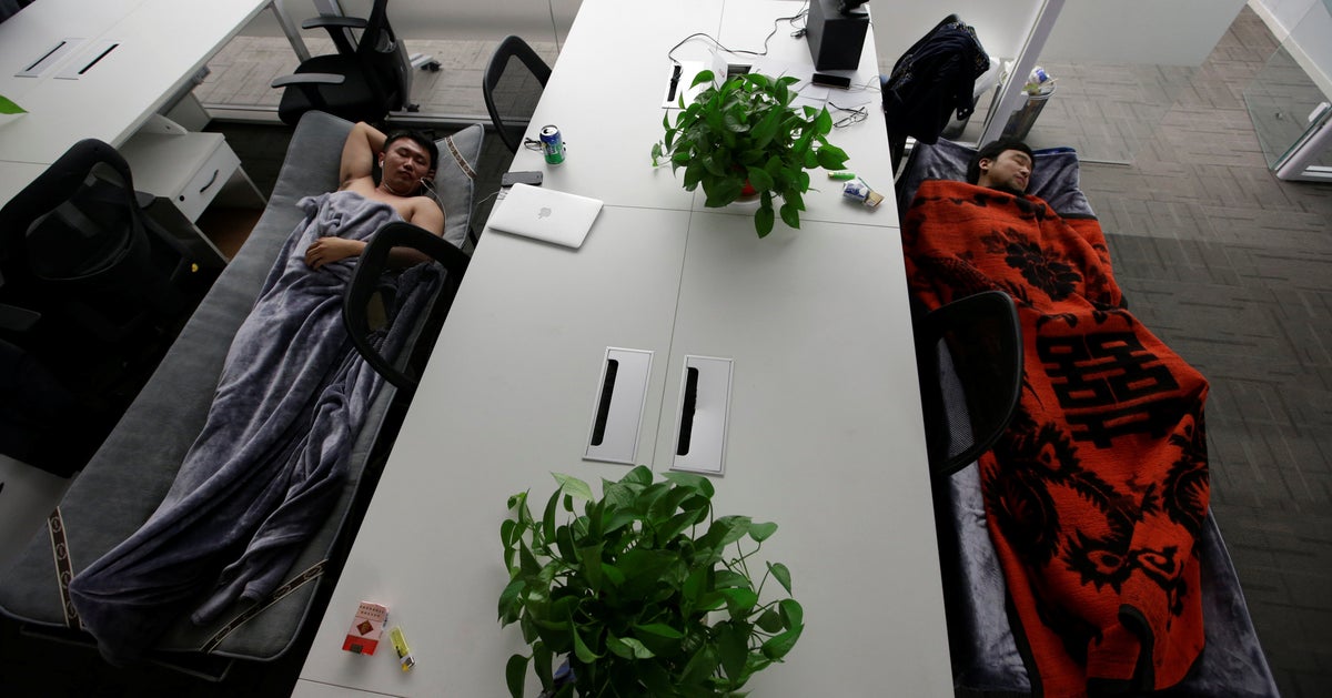 PHOTOS: The Chinese Tech Workers Who Have To Sleep At The Office ...