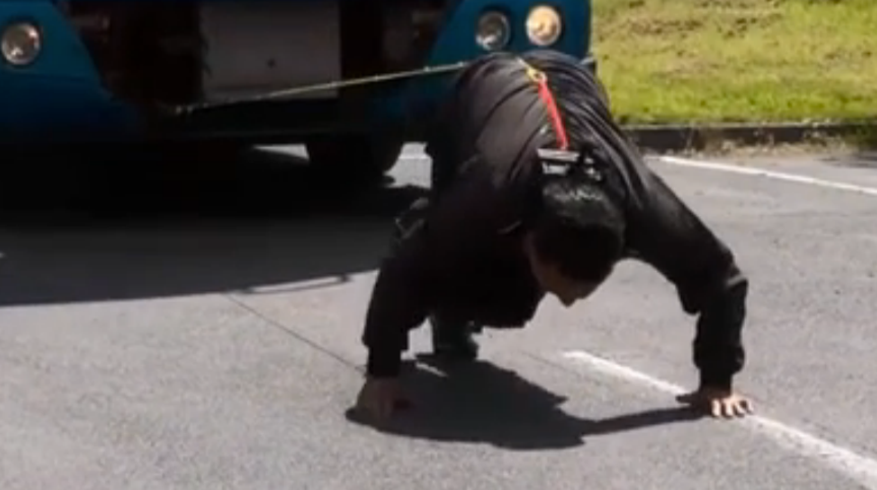 Watch This Strongman Pull A 9.5-Ton Truck Using Only His Hair ...