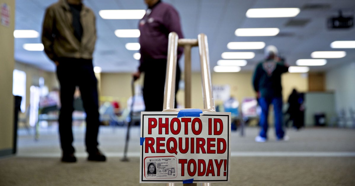 Wisconsin Voter ID, Early Voting Law Partially Struck Down By Judge ...