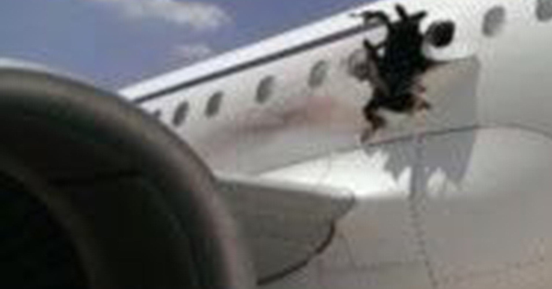 Cell Phone Video Captures Terrifying Flight After Blast Rips Hole In ...