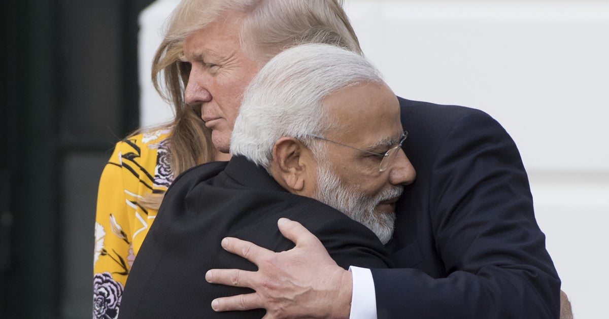 Donald Trump Looks Exceptionally Uncomfortable Hugging Narendra Modi ...