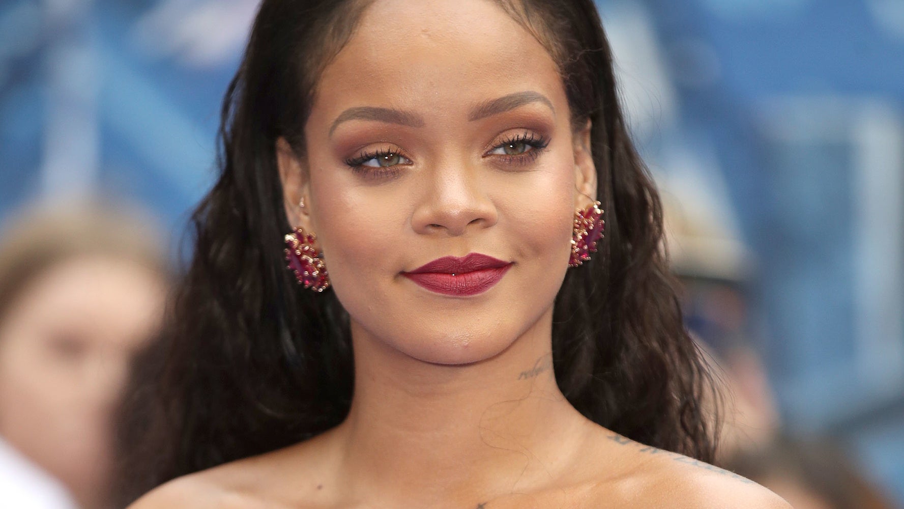 Rihanna's Low-Cut Red Gown Is A Wardrobe Malfunction Waiting To Happen ...