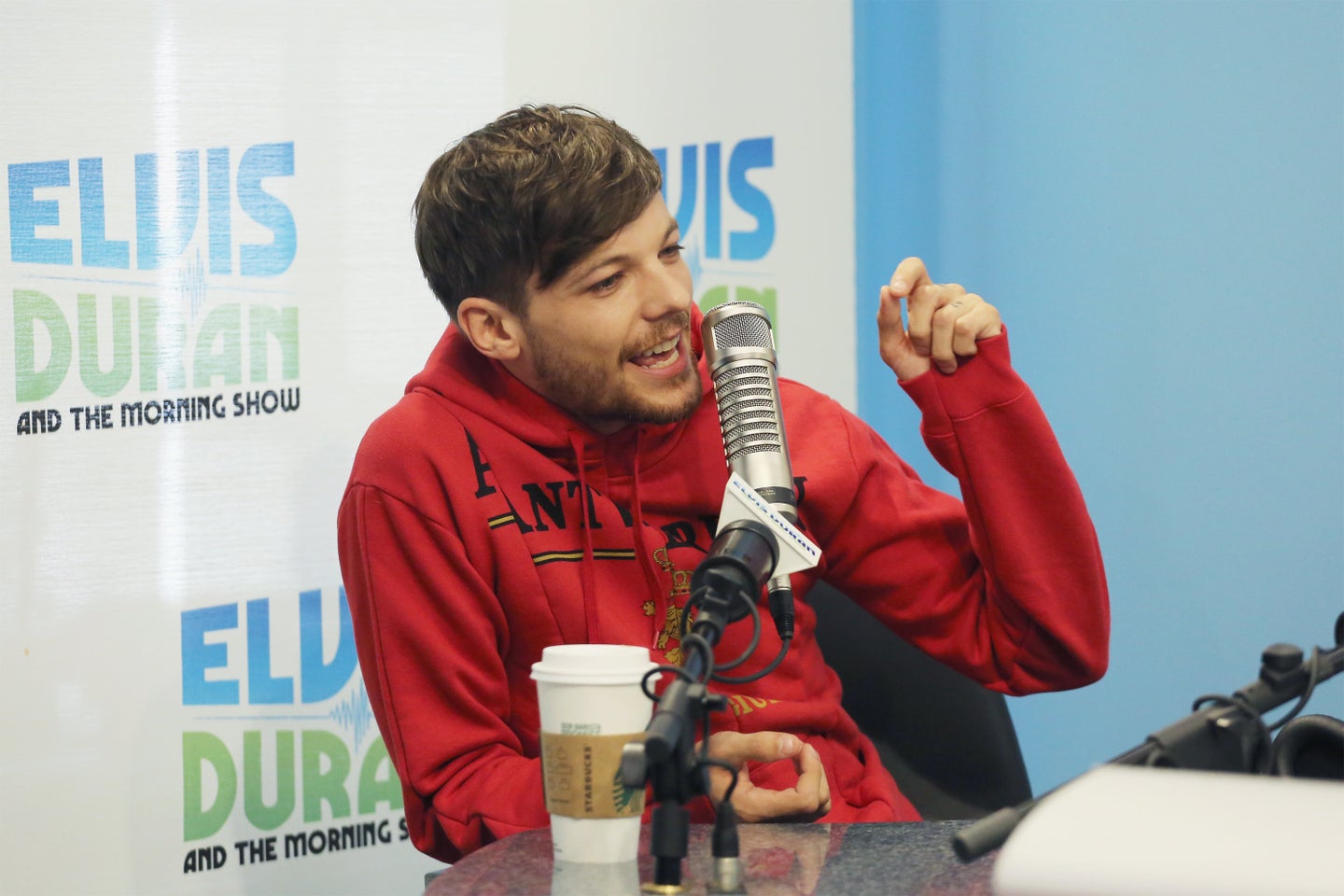 Louis Tomlinson Says Simon Cowell Flew Him Across The Globe To Tell Him ...