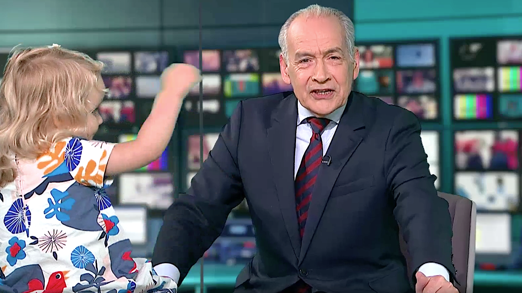 News Anchor Keeps His Cool As Toddler Runs Riot During Live Studio ...