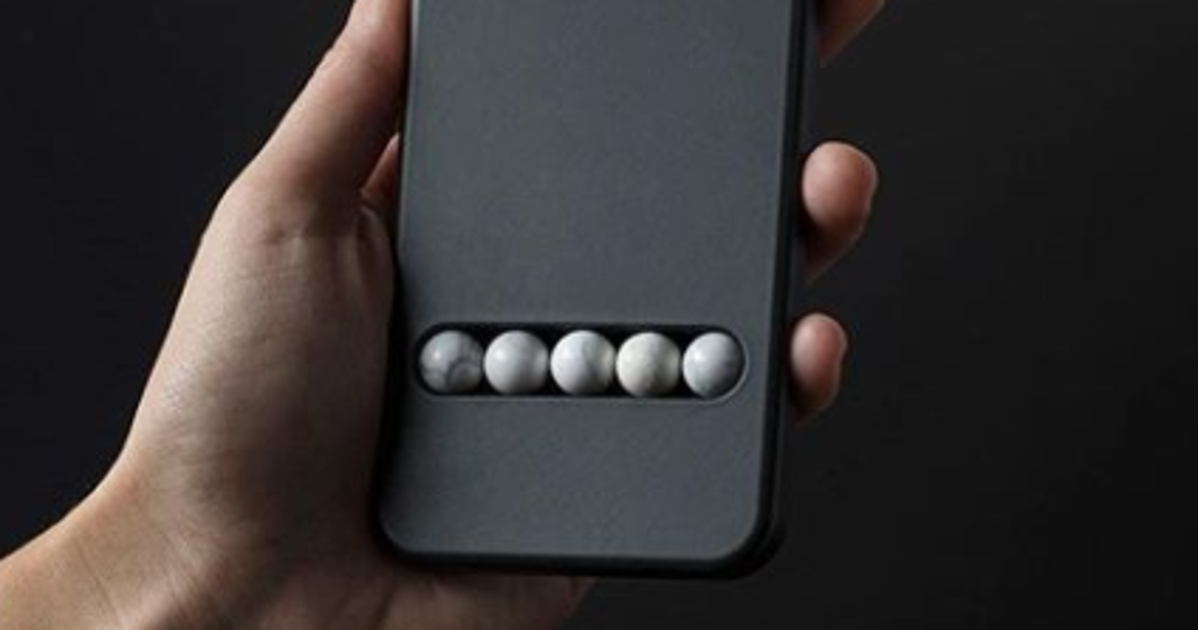 This Weird-Looking Gadget Is The Fidget Spinner For Smartphone ...