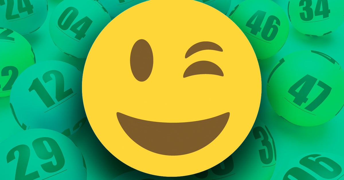 Lottery Winner Picks Up Check In Emoji Wink Mask | HuffPost Weird News