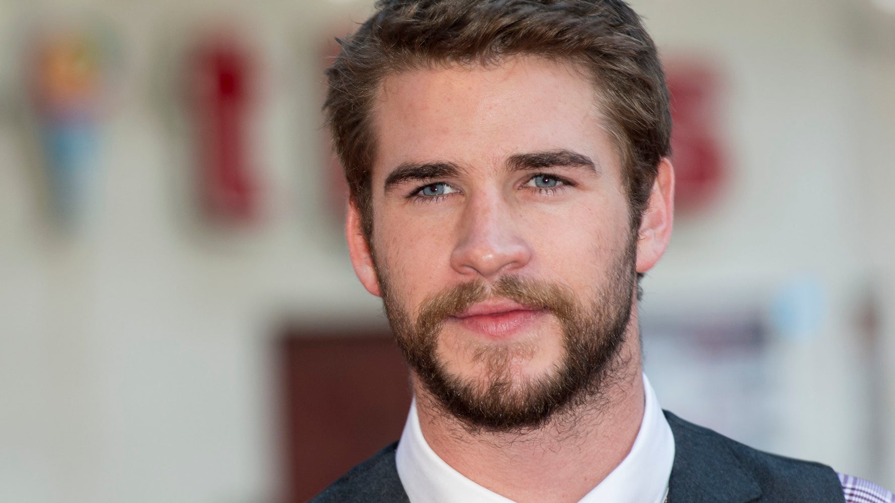 Liam Hemsworth's New Woman? | HuffPost Videos