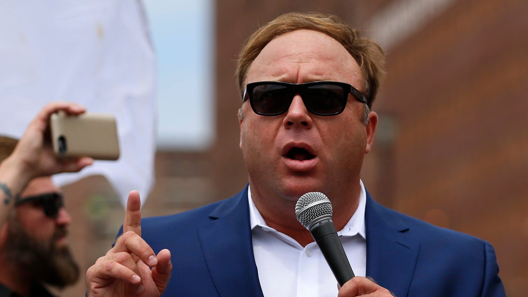 Spotify Pulls Radio Show Episodes By InfoWars' Alex Jones After ...