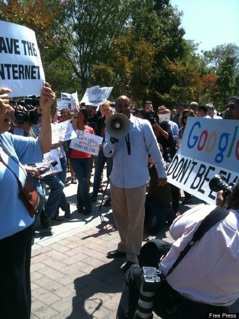 Protesters At Google Headquarters Blast 'Evil' Pact With Verizon ...