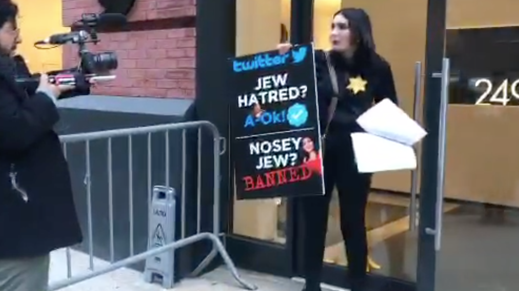 Right Wing Conspiracist Laura Loomer Handcuffs Herself To Door Of