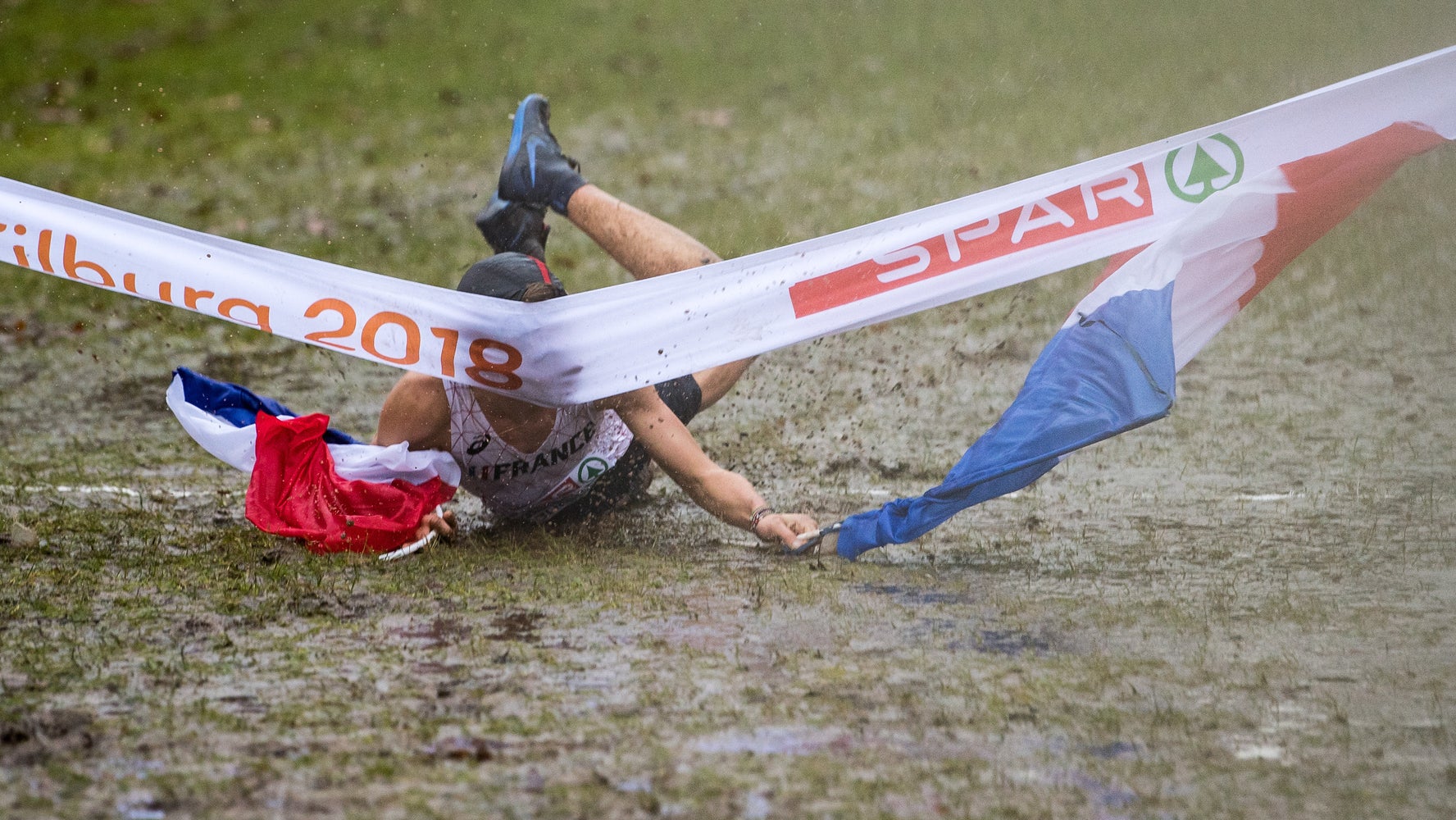 Finish-Line Slide Goes ‘Horribly Wrong’ As Runner Face-Plants His Way ...