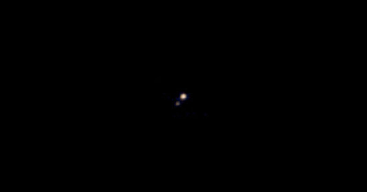 Pluton: Une première photo en couleur prise par la sonde New Horizons ...