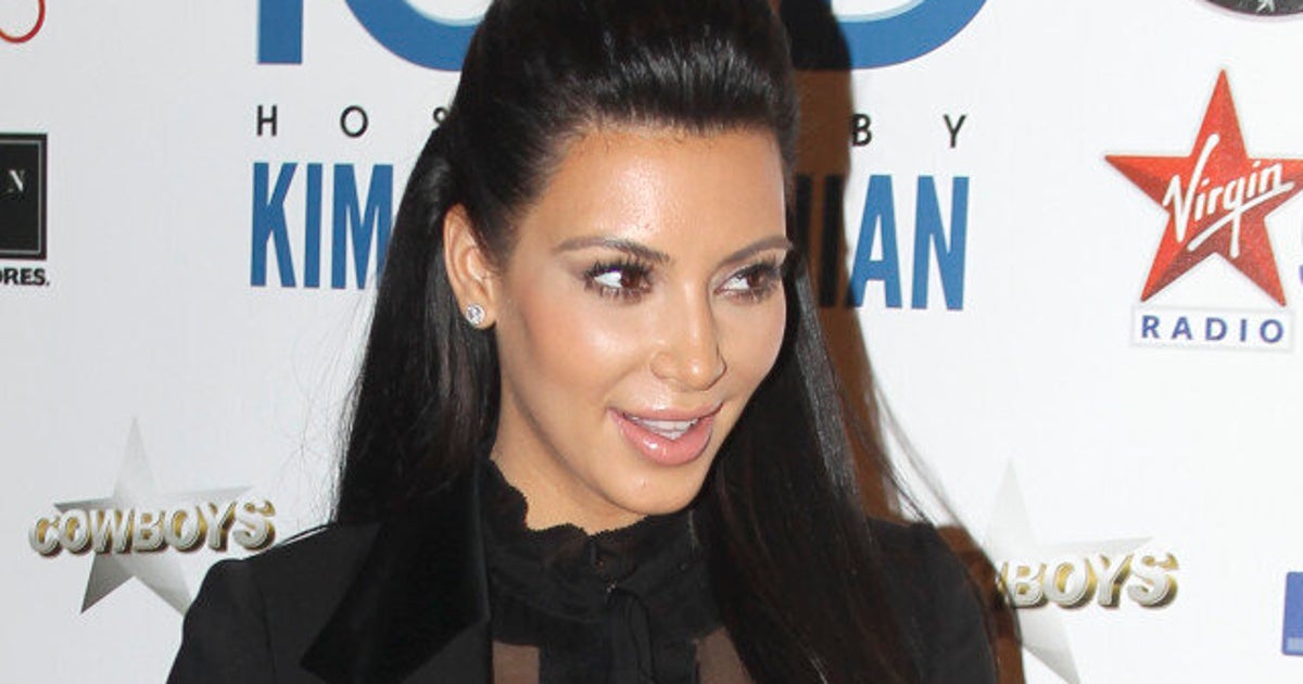 Kim Kardashian At Calgary Cowboys: Pregnant Reality Star Attends 17th ...