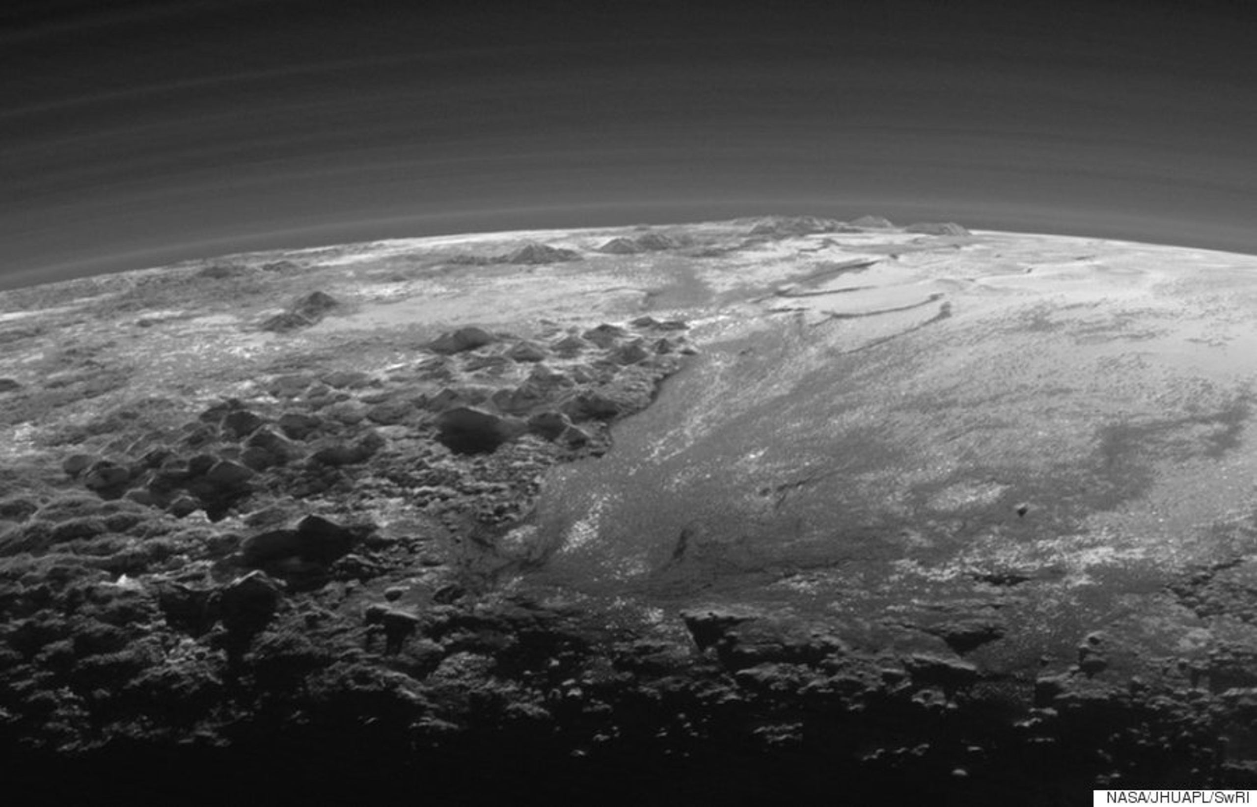 NASA's New Horizons Images Of Pluto Reveal Its 'Surprisingly Earth-Like ...