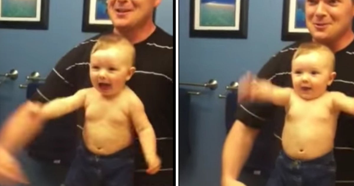 Adorable Baby Imitates Dad By Flexing Muscles In Hilarious Clip ...