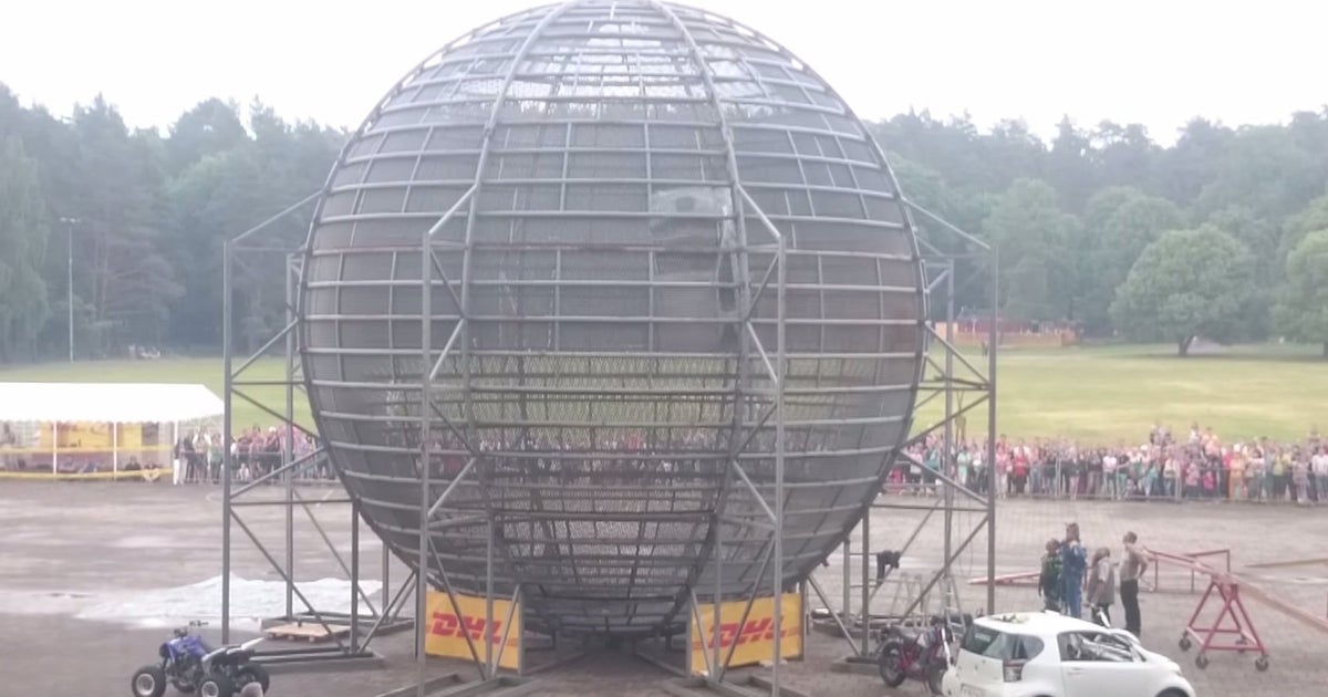Watch This Car Pull Off Gravity Defying Stunt In World's Biggest Cage ...