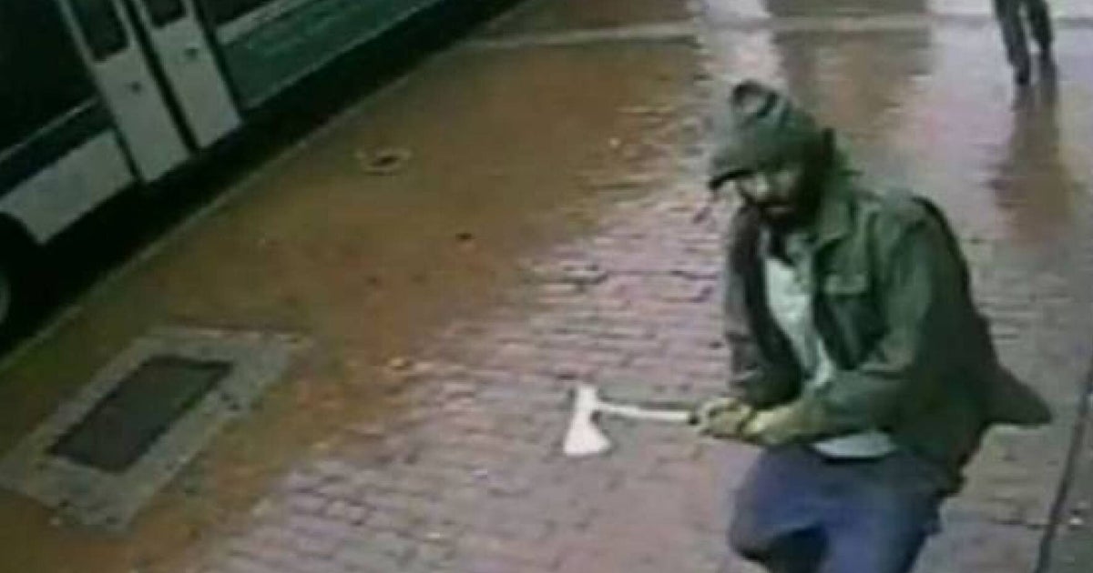 Axe-Wielding Man Attacks Police Officers In New York Captured On CCTV ...