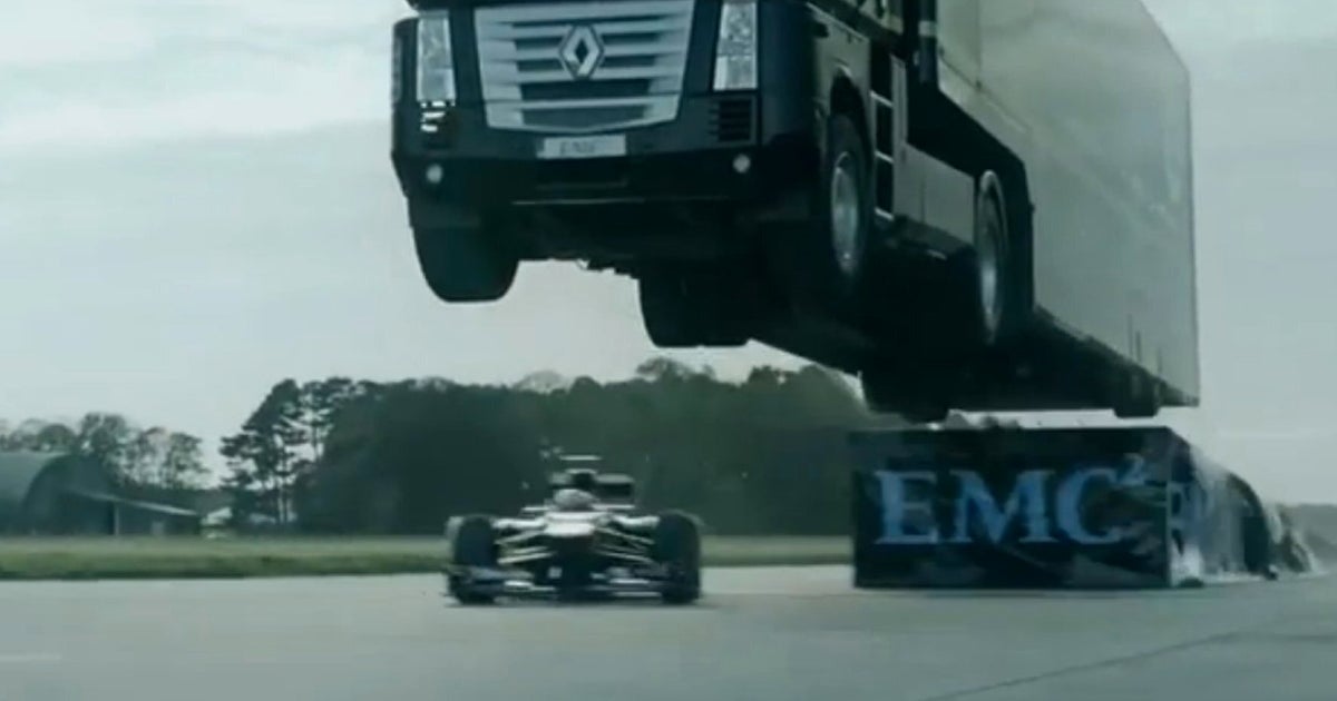 Insane Stunt Sees Massive Truck Jump Over F1 Car | HuffPost UK Tech
