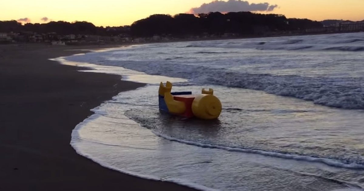 Giant Lego Figure Washed Up On Japanese Beach Is A Beautiful Work Of ...