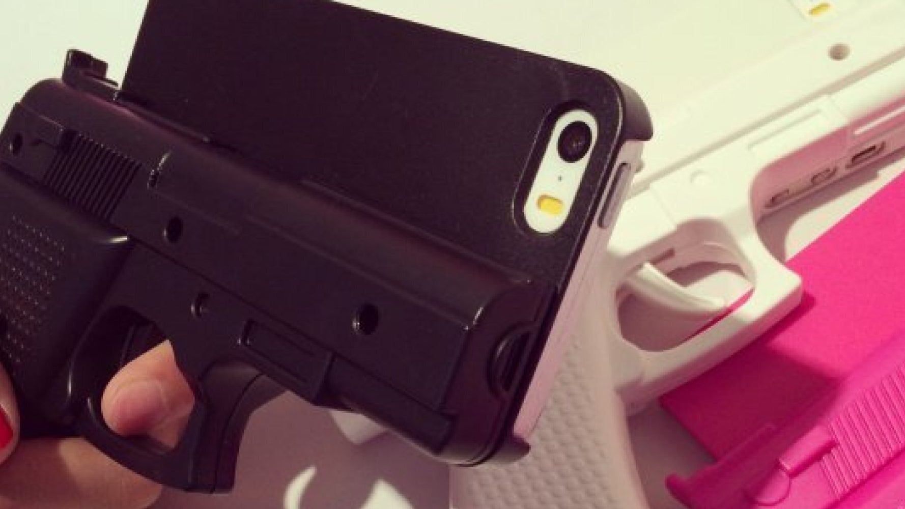 Buying This Realistic Gun iPhone Case Is Probably Not A Great Idea ...