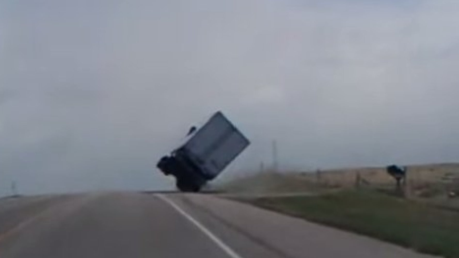 Impressive Driving Skills Of The Day: Truck Almost Blows Over In High ...