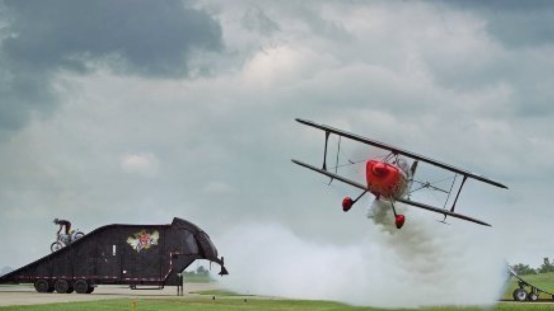 Motorcycle Jumps Sideways Plane, Because Life Is Cheap And Plentiful ...