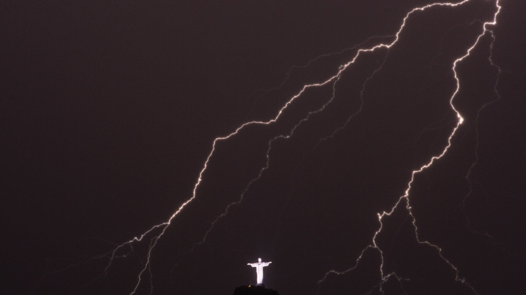 Christ The Redeemer Statue In Brazil Lit Up By Fierce Lightning Bolts ...