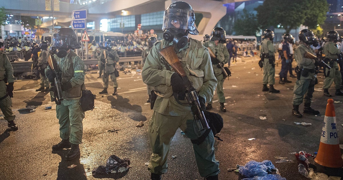 Hong Kong Pro-Democracy Protesters Clash With Police In Surreal Scenes ...