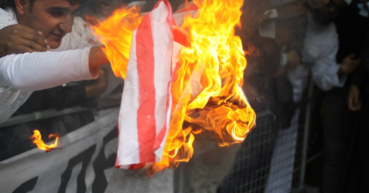 US Embassy Protests: Flag Burned During Demonstration Outside London ...