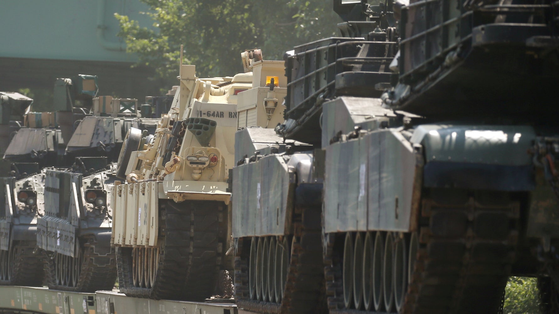 U.S. Military Tries To Reassure Spooked Public As Tanks Roll Into ...