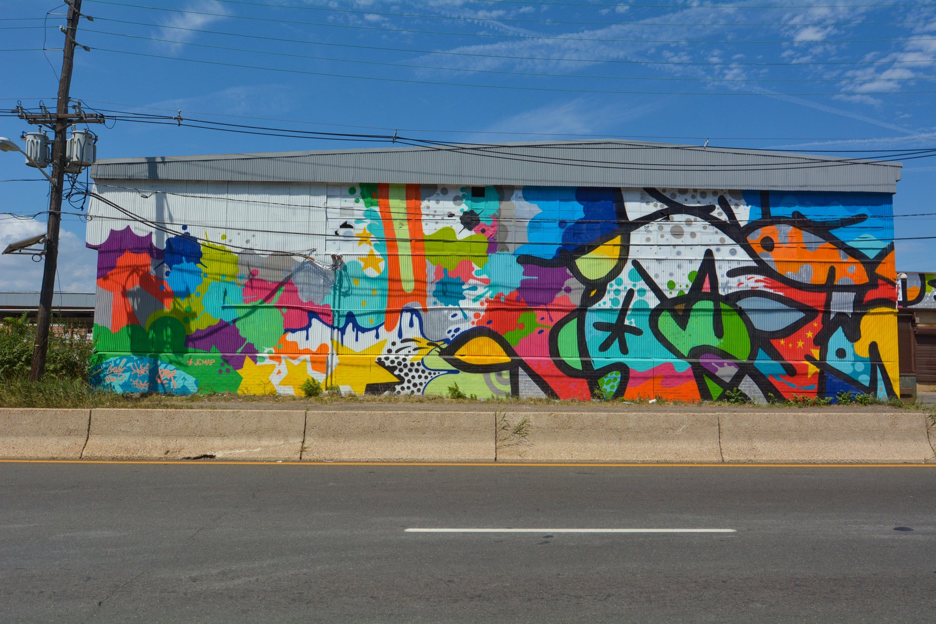 The Stunning Street Art Murals Combating Graffiti In Jersey City ...