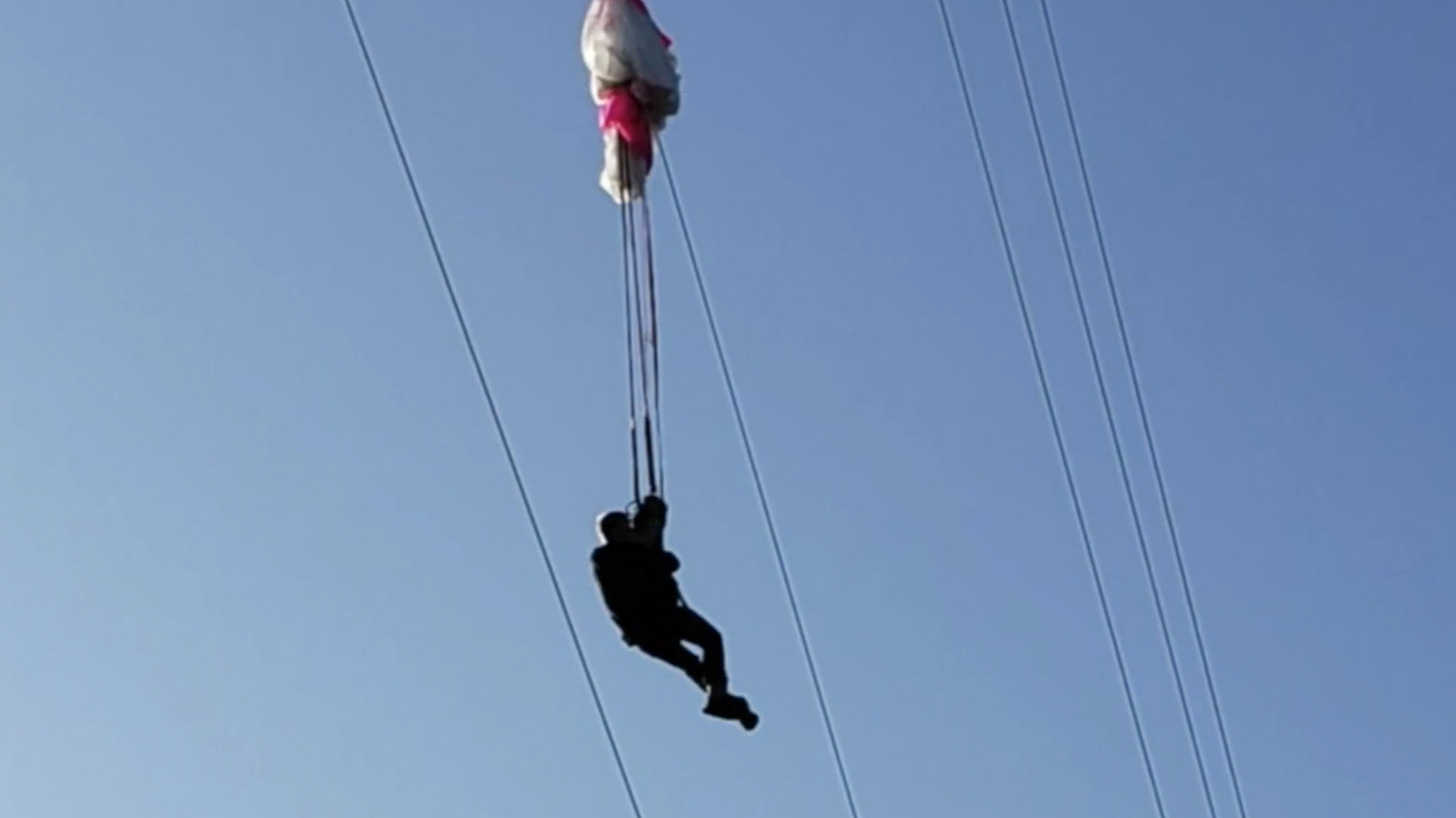 Illegal BASE Jumper Gets Parachute Stuck On Cell Tower | HuffPost