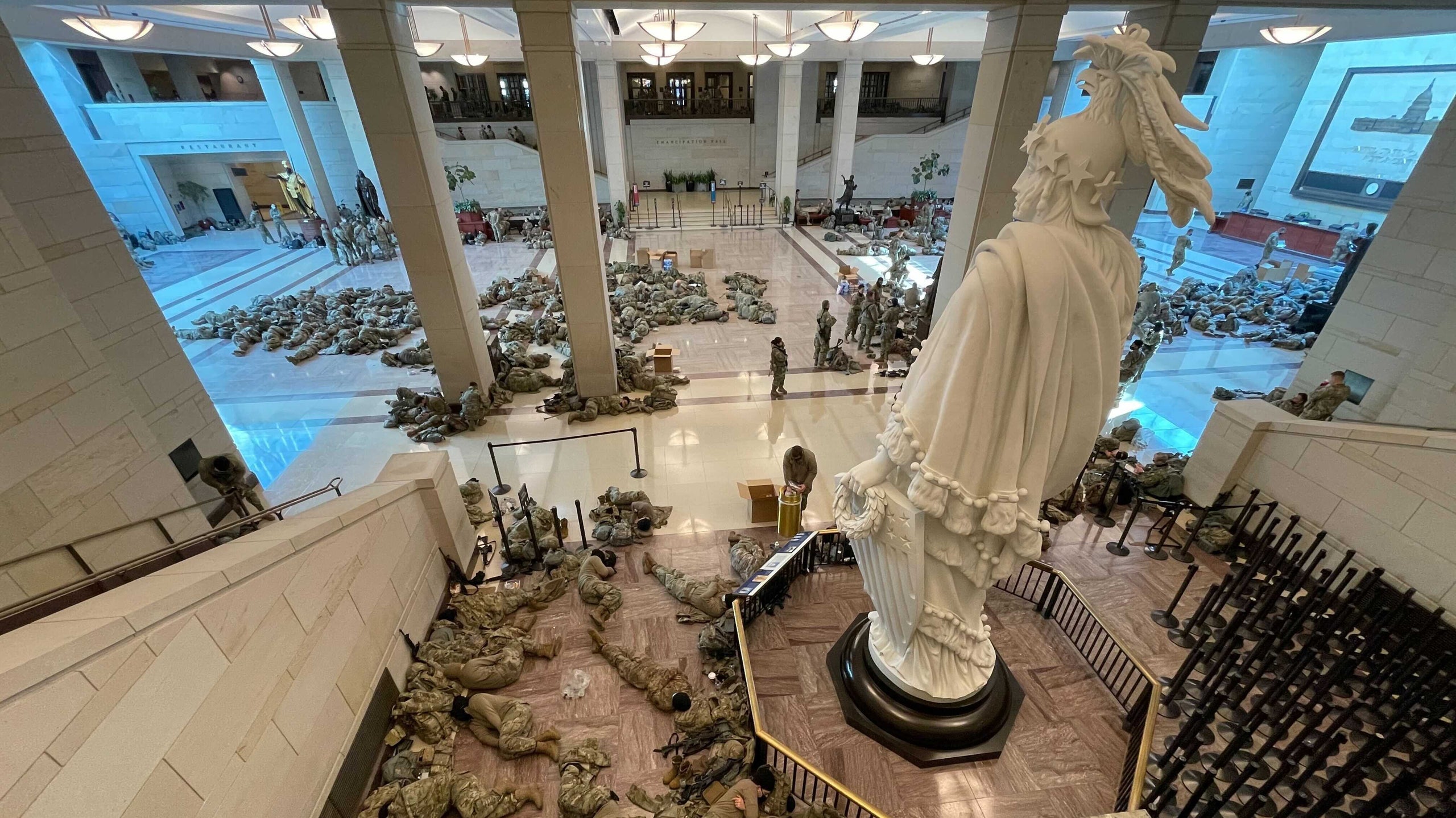 Striking Photos Show Hundreds Of National Guard Troops Sleeping Inside ...