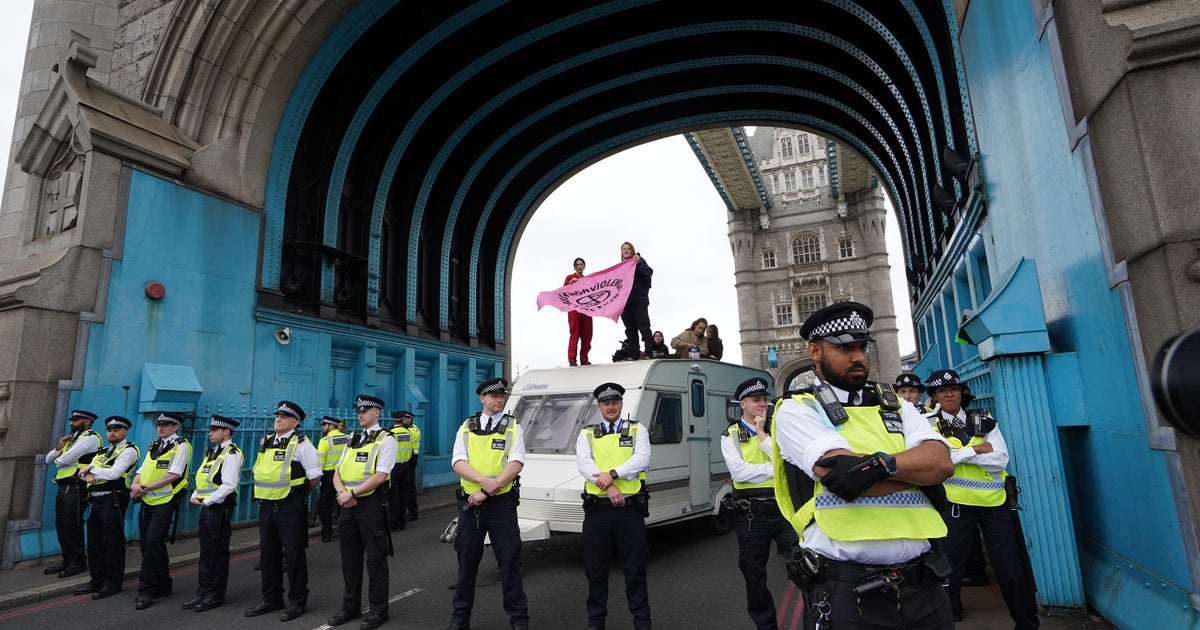 Extinction Rebellion's Sit-Down Protest Blocks Tower Bridge | HuffPost ...