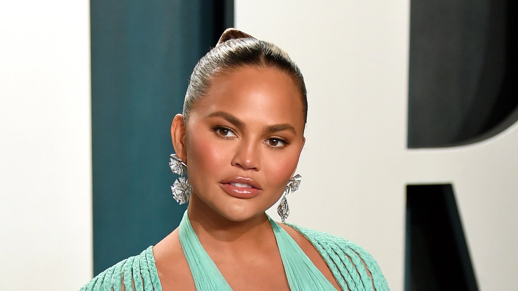 Chrissy Teigen Explains Why Her Family Travels With Baby Jack's Ashes ...