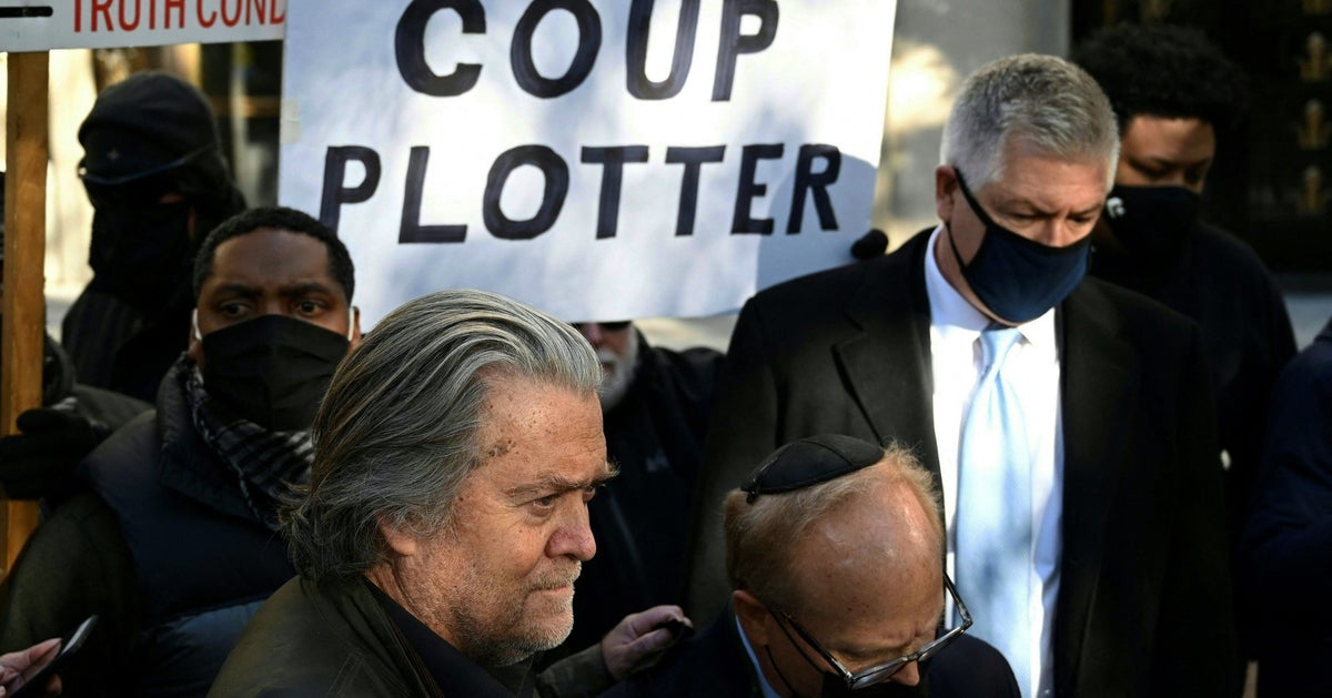 Protester With 'Coup Plotter' Sign Rains On Steve Bannon's Propaganda ...