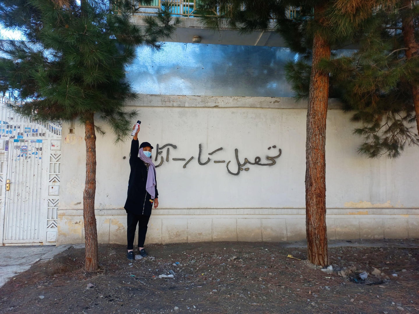 Woman In Afghanistan Spray-Paints Walls To Protest The Taliban ...