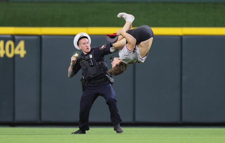 Cincinnati Reds Fan Shocked With Taser After Landing Backflip ...