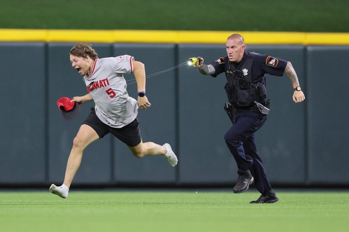 Cincinnati Reds Fan Shocked With Taser After Landing Backflip ...