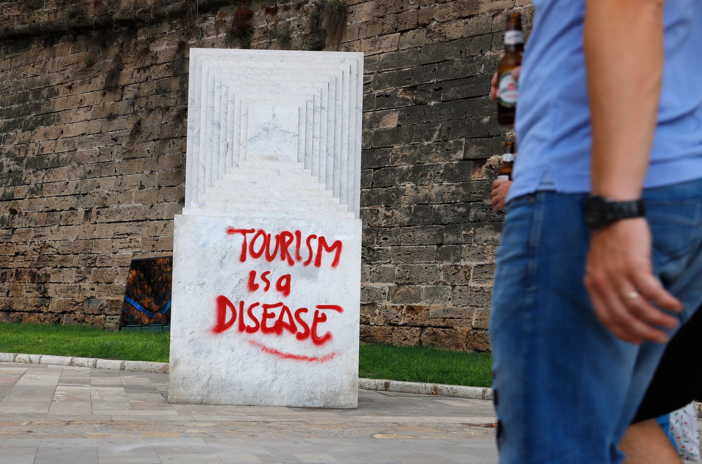 'It's Tourist Hunting Season': The Street Art That's Seething About ...