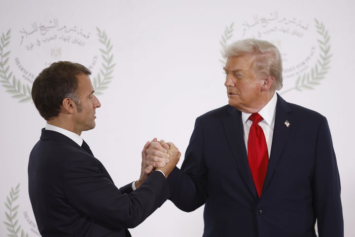 Trump Refuses To Let Go Of Macron During Aggressively Long Handshake At ...