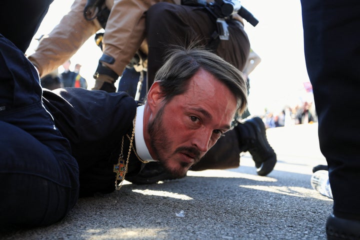 Nearly Two Dozen Arrested As Faith Leaders Protest Outside Chicago-Area ...