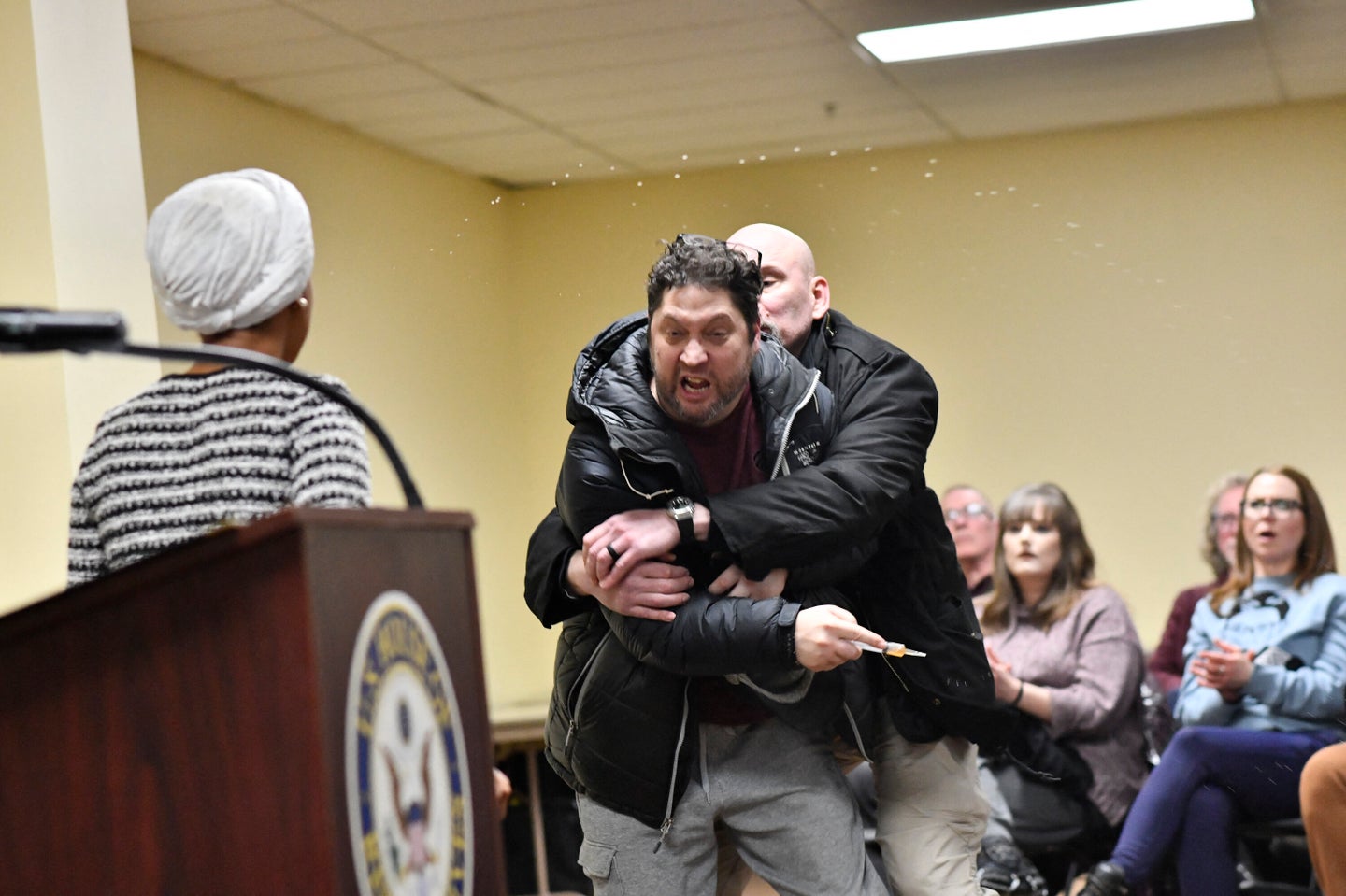 Man Tackled After Spraying Unknown Substance On Rep. Ilhan Omar ...